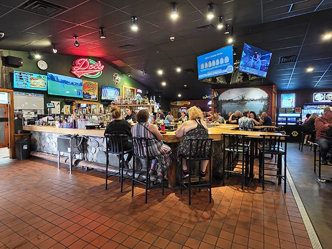 The bar area buzzes with energy while maintaining that cozy lodge feel that makes you want to settle in for hours.