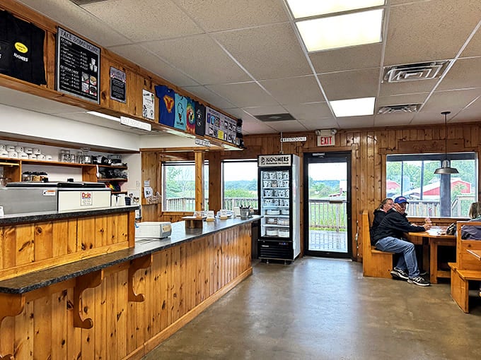 Interior: Knotty pine walls and simple furnishings create the perfect backdrop for ice cream magic &ndash; like Grandma's cabin, if Grandma were a frozen dairy wizard.