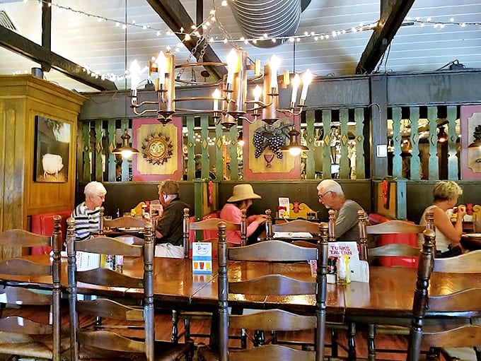 Step inside to discover warm wood paneling, twinkling lights, and the kind of authentic tavern atmosphere you can't fake or manufacture.