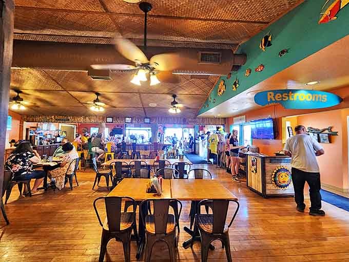 Inside, the warm wood tones and tropical ceiling create that perfect "I'm officially on vacation" vibe, even if you're just on lunch break.