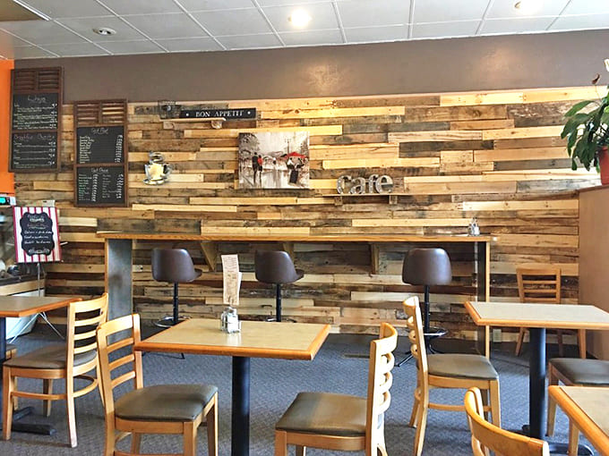 Rustic wooden accents create a cozy atmosphere where time slows down, inviting patrons to linger over coffee and conversation.
