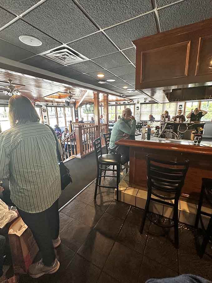 Inside Jake's, the vibe is "your cool friend's finished basement" meets "actual restaurant that knows what it's doing with walleye."