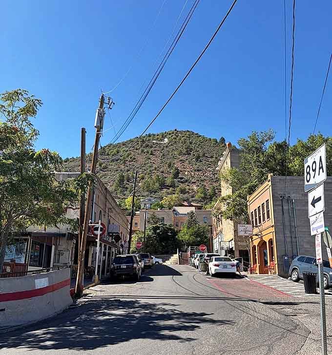 Main Street climbs the hillside at an angle that'll make your calves burn, lined with galleries and shops occupying buildings that have witnessed over a century of Arizona history.