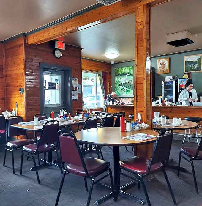 Interior: Warm wood paneling and no-frills seating create the perfect backdrop for memorable meals and conversations that flow as freely as the coffee.