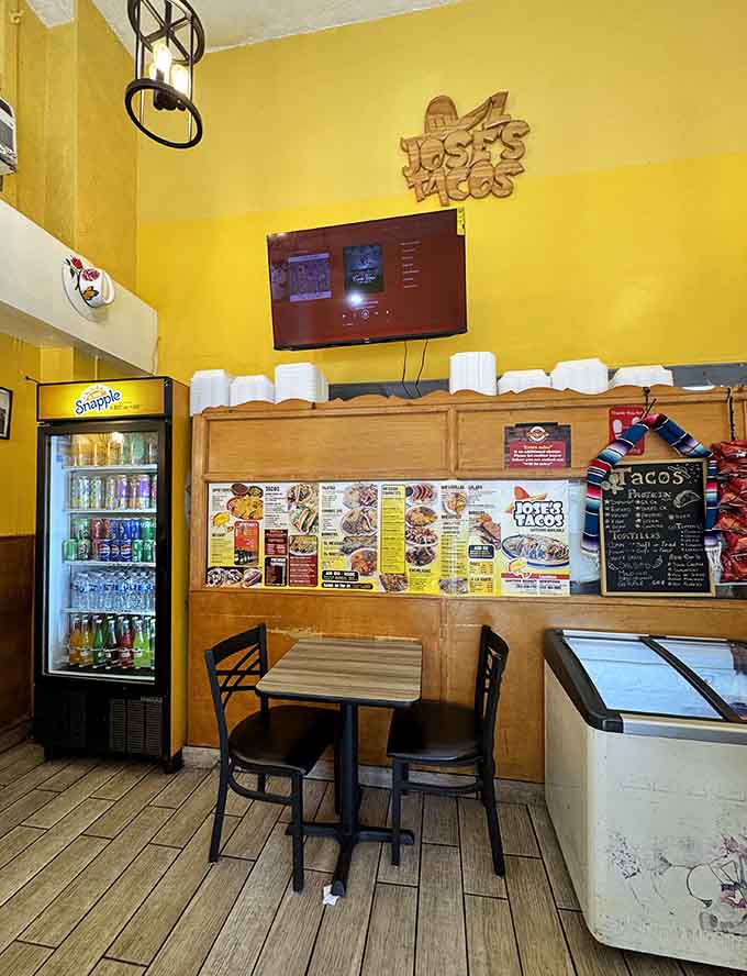 Sunny yellow walls create an instantly cheerful atmosphere that makes you smile before you've even ordered your first taco.