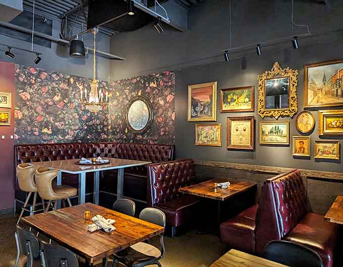 Burgundy leather booths and eclectic art create an atmosphere that's equal parts sophisticated and welcoming, like dining in a really cool friend's place.