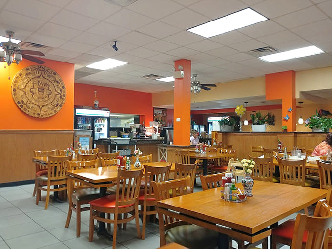 Bright walls and wooden tables create a welcoming space where the focus stays squarely on the incredible food coming from the kitchen.
