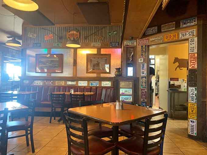 Step inside to discover walls adorned with vintage license plates and Western memorabilia that tell stories of countless satisfied diners over the years.