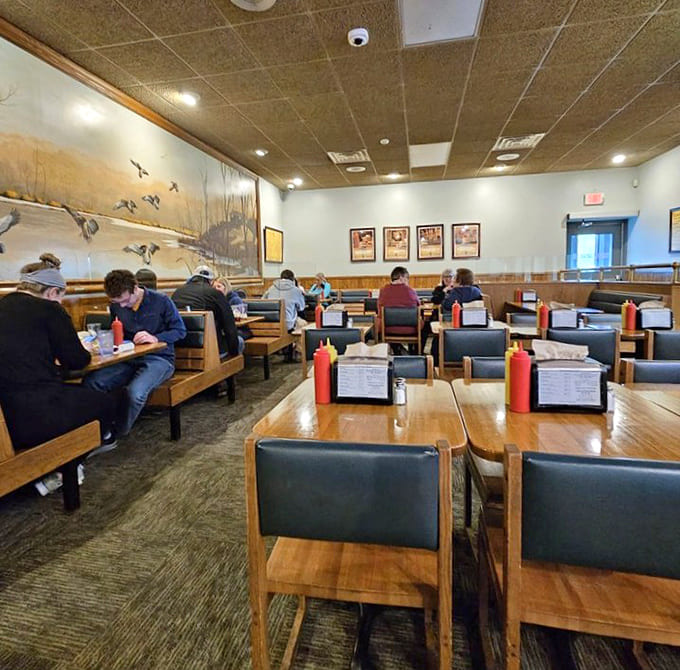 Wood paneling and comfortable booths create the perfect burger-eating environment, no fancy decor required for this delicious mission.