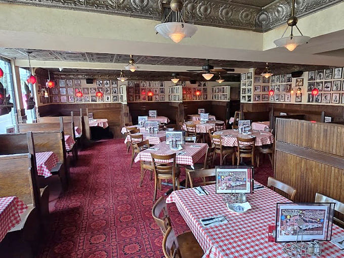 Step inside to find checkered tablecloths, ornate ceilings, and walls covered with photographs telling decades of delicious stories.