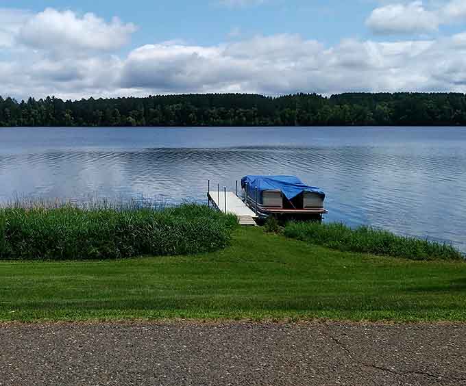 This dock stretches into Moose Lake like an invitation to sit, dangle your feet, and forget what day it is.