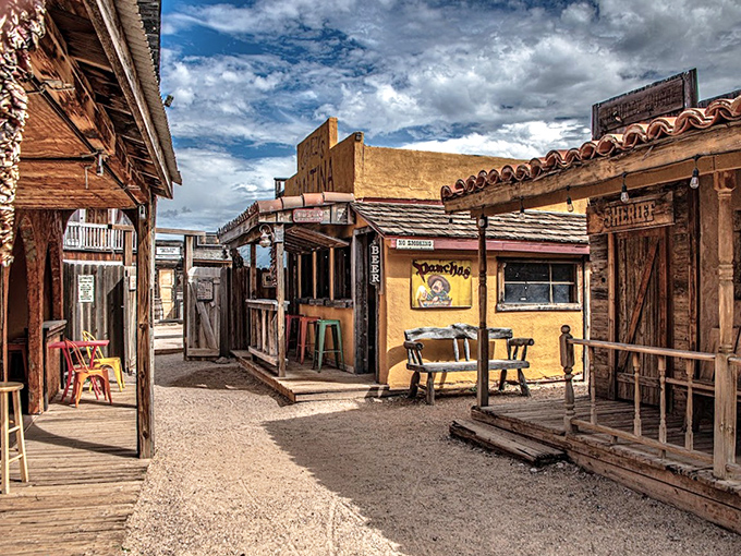 Wander down this weathered alleyway where every creaking board tells a story, and you half-expect a tumbleweed to roll by on cue.