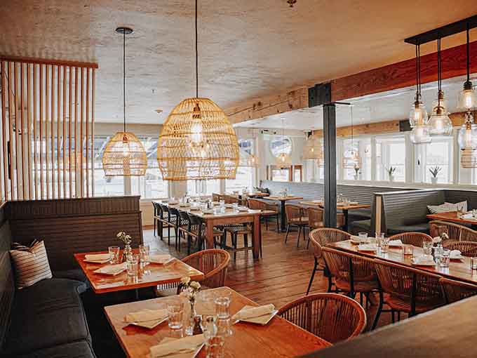 Inside, woven pendant lights and warm wood create an atmosphere that's both polished and welcoming to everyone.
