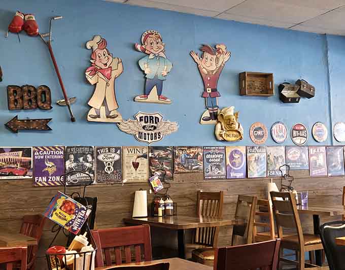 Bright blue walls meet rustic wood and vintage Americana in a space that feels like your fun uncle's favorite hangout.