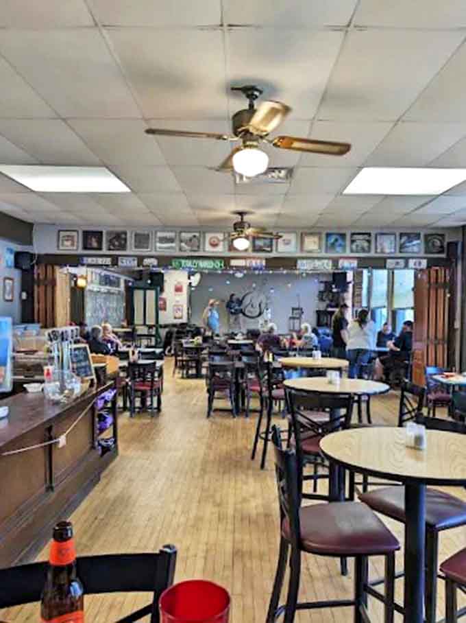Inside, wooden floors and ceiling fans create the perfect backdrop for community gatherings, where strangers become friends over steaming plates of comfort food.
