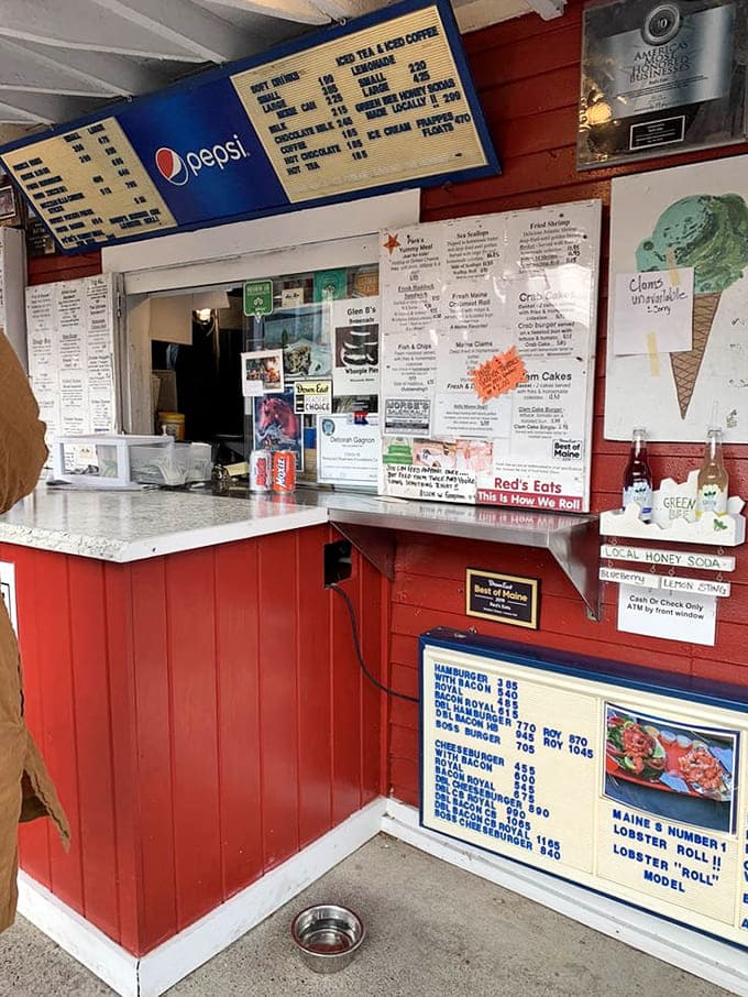 The order window at Red's Eats has seen more hungry customers than most restaurants see in a lifetime, and it shows.