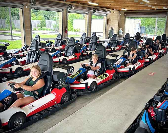 Like a colorful caterpillar of excitement, these go-karts await their next drivers &ndash; each seat promising three minutes of pure, unadulterated freedom.