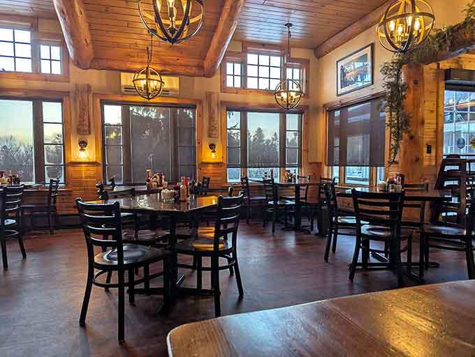 Inside, wooden beams and warm lighting create an atmosphere where stress melts faster than butter on hot pancakes.