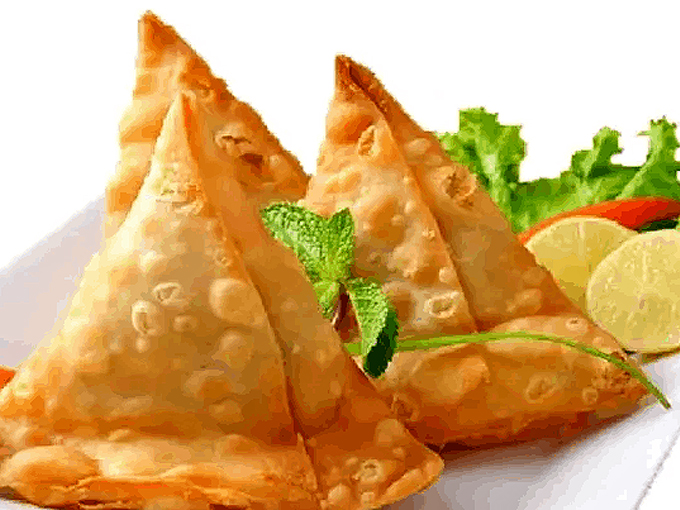 Crispy triangles of joy! These samosas are like edible gift boxes, each bite unwrapping layers of spiced potato goodness.