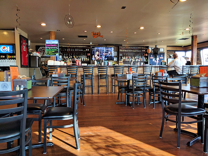 Cozy booths and warm wood tones invite you to settle in. This isn't just dinner, it's a full-contact eating experience.