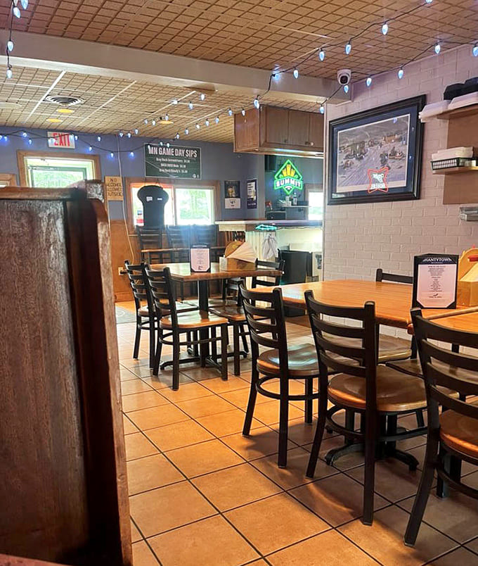 Inside, warm lighting and comfortable seating create the perfect burger-eating environment where everyone feels welcome and hungry.