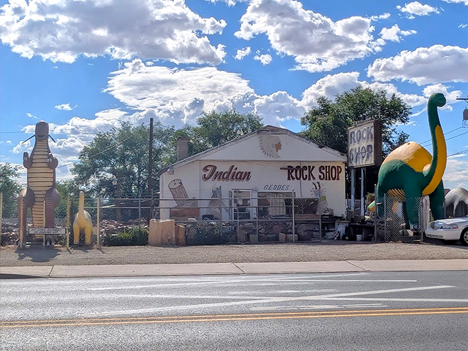The unassuming exterior belies the wonders inside, with dinosaur sentinels standing watch over this Route 66 gem.