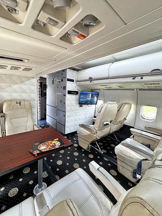 Plush white leather seats and original overhead compartments create an authentic aviation experience while you sip your favorite brew in comfort.