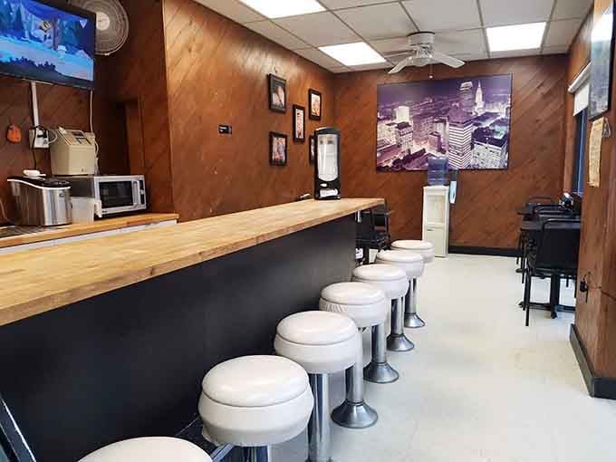 Wood paneling and swivel stools create a retro vibe where the donuts are the real stars of the show.
