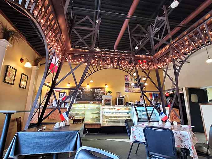 Step inside and you're greeted by an Eiffel Tower replica that sets the Parisian mood without being too on the nose about it.