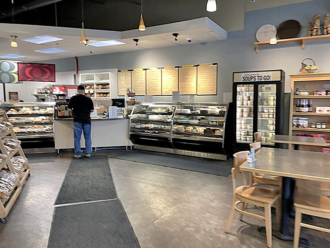 Clean lines and well-lit cases create a modern European café vibe that makes choosing just one pastry nearly impossible.