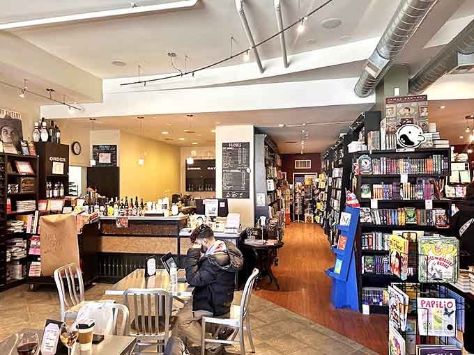 Inside, wooden shelves and industrial touches create the perfect backdrop for literary exploration, where readers lose track of time.