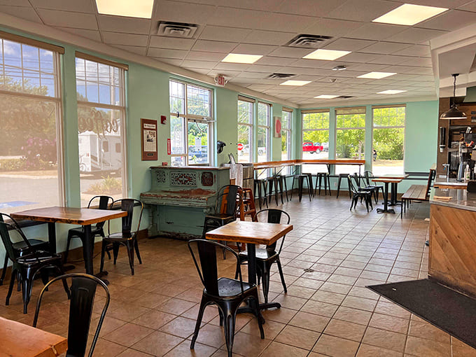 Mint walls and metal chairs create the perfect backdrop for your impending donut-induced happiness.