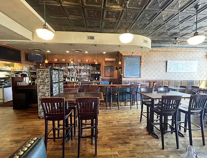 Tin ceilings and warm lighting create the perfect backdrop for serious eating and even better conversation.