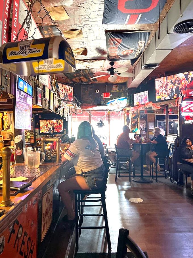 Every inch of wall space tells a story here, creating a visual feast before your actual feast even arrives.