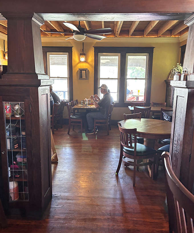 Step into a space where exposed beams meet warm hospitality, and suddenly you understand why people drive miles for lunch.