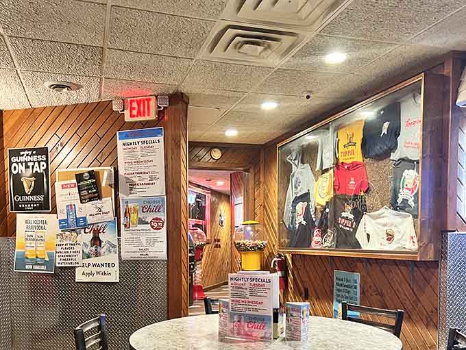 Step inside to wood-paneled walls and neon signs that create the perfect neighborhood bar atmosphere where everyone feels welcome.