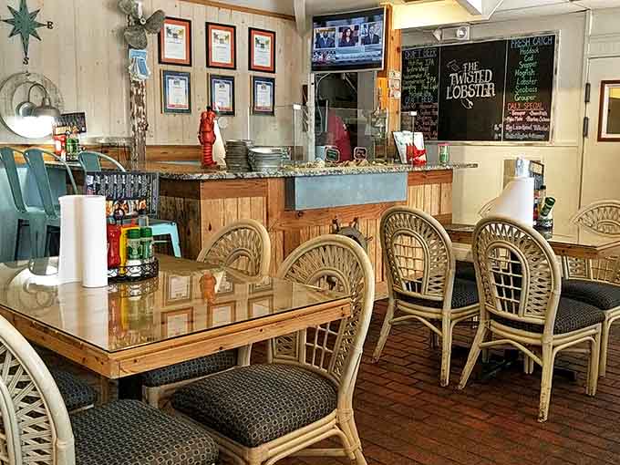 Coastal charm meets casual comfort in this inviting dining space. Rattan chairs and wooden tables create the perfect backdrop for seafood feasts and those legendary ribs.