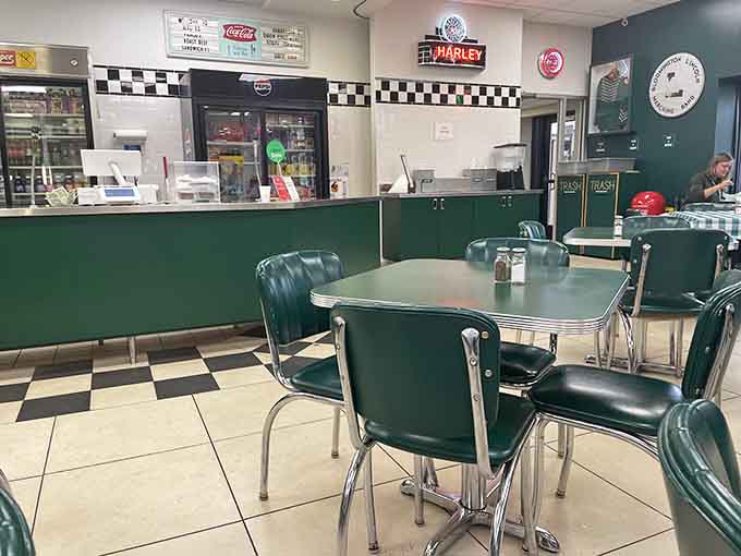 Step into a time machine disguised as a diner, complete with green vinyl chairs and checkered floors.