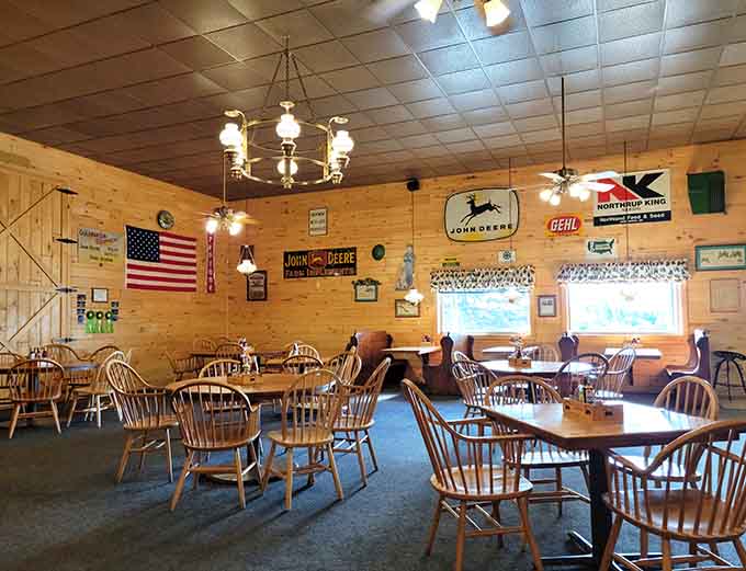 Farm signs and vintage charm create an atmosphere where tractors are celebrated and appetites are satisfied.