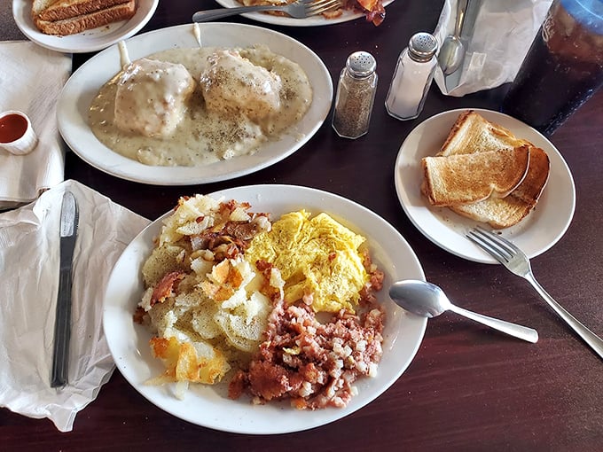 Behold, the breakfast of champions! Golden hash browns steal the show, while eggs and meat play delicious supporting roles.