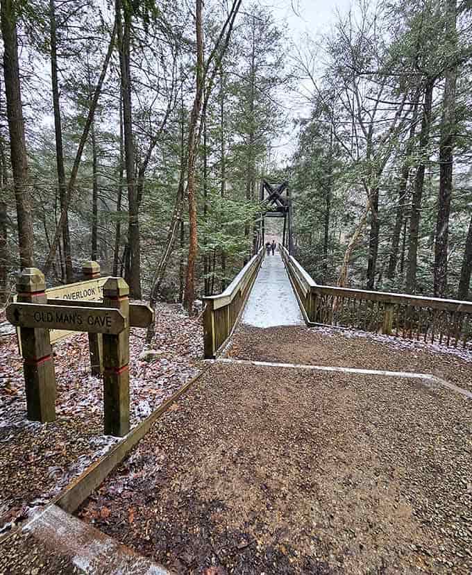 The bridge to adventure spans across Old Man's Cave, inviting hikers to cross into a world of natural wonders.
