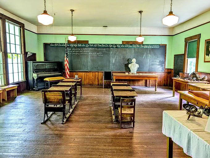 Step into this time-frozen classroom where wooden desks and a well-worn chalkboard whisper stories of simpler educational times.