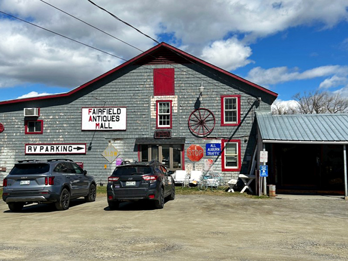 From this angle, the vintage wagon wheel and "RV Parking" sign hint at the adventures waiting inside this unassuming treasure vault.