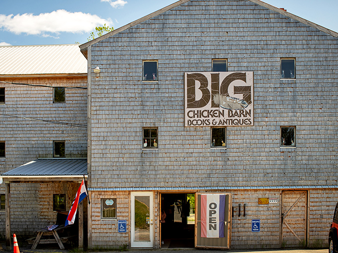 Weathered wooden shingles tell stories of Maine winters past, while the straightforward signage promises treasures for those willing to step inside.