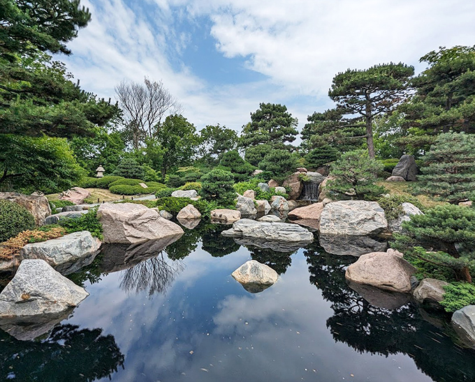 Tranquility flows through Como's Japanese Garden, where carefully placed stones and reflective waters create a meditative escape.