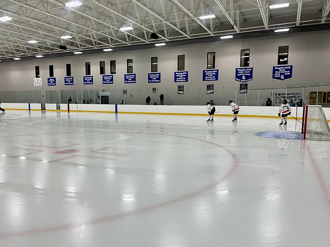 Where hockey dreams are made: The pristine ice surface awaits its next transformation from serious sport to playful pandemonium.