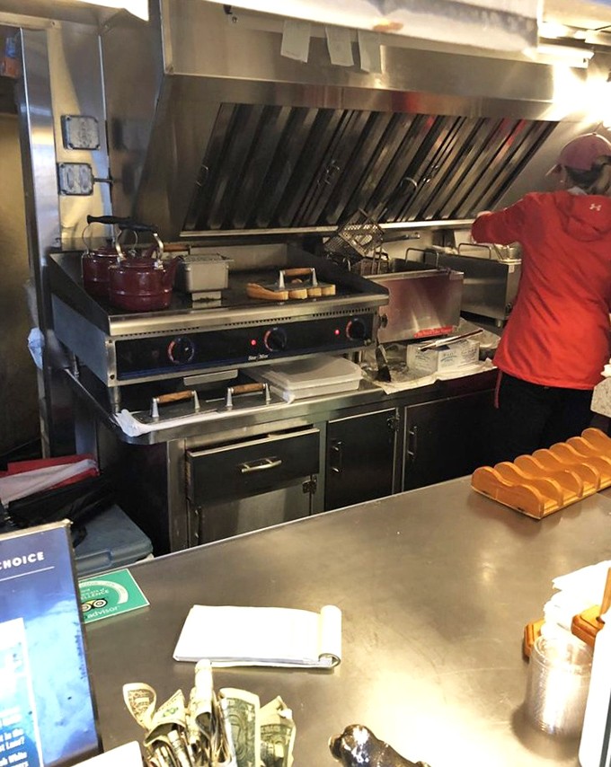Behind the scenes magic where lobster dreams come true &ndash; a glimpse into the compact kitchen that produces legendary seafood feasts.