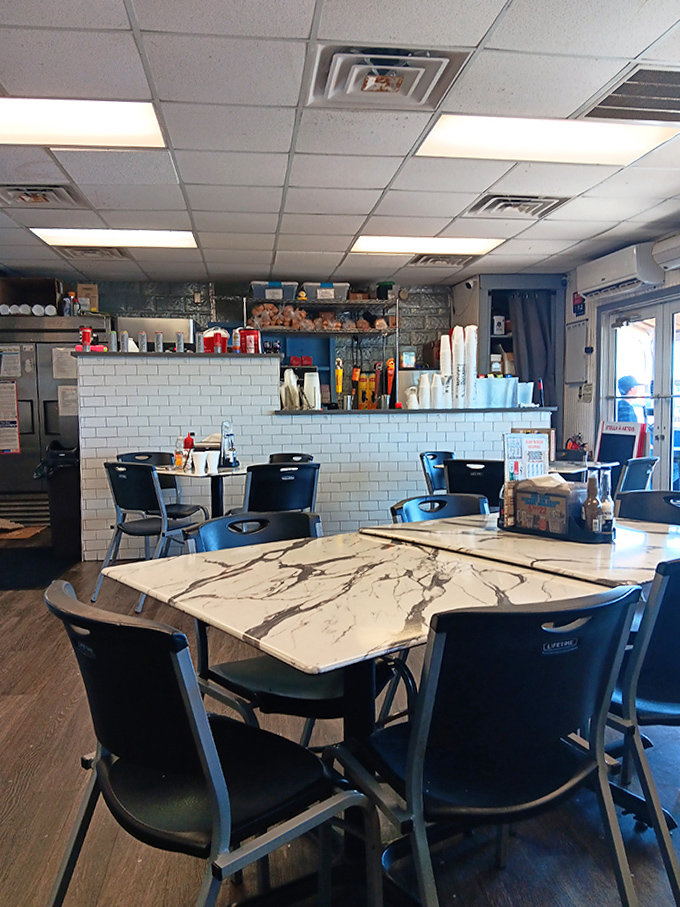 Simple, clean interiors let the food take center stage, with marble-topped tables offering a touch of unexpected elegance.