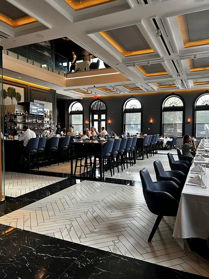 Coffered ceilings aglow with amber light hover above the bustling bar, where Jacksonville's past meets its delicious present.