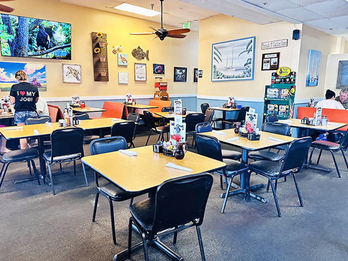 Inside Alice's, yellow walls and classic diner tables create that "everybody knows your name" vibe where breakfast dreams come true.